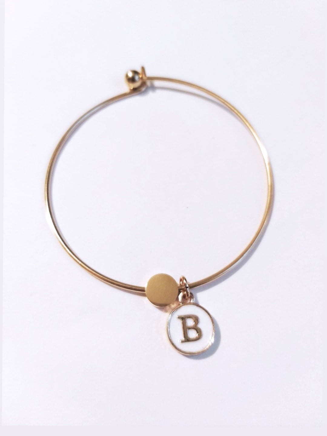 Circle ⏺ Gold Initial Charm Bangle - Stainless Steel | Culture Shock ...